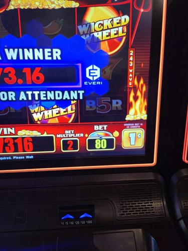 Smokin' Hot Stuff Wicked Wheel Slot Machine by Everi Games Inc.